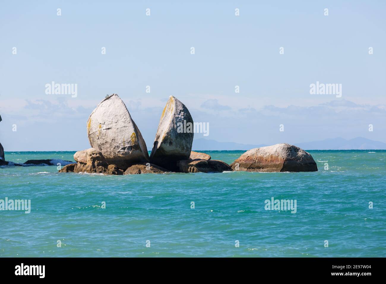 Split Apple Rock in New Zealand coast Stock Photo - Alamy