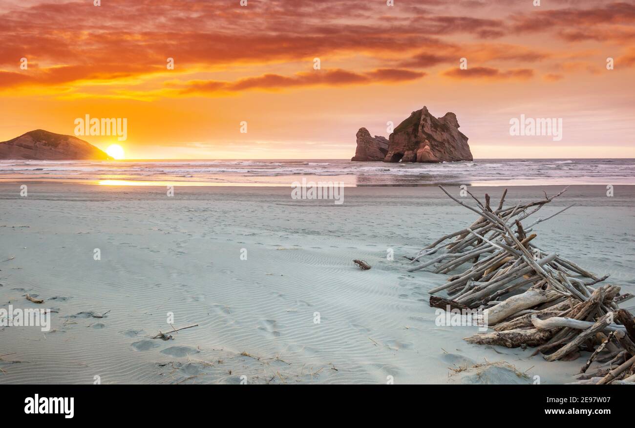 The Archway Islands of Wharariki Beach at sunset in New Zealand Stock Photo - Alamy