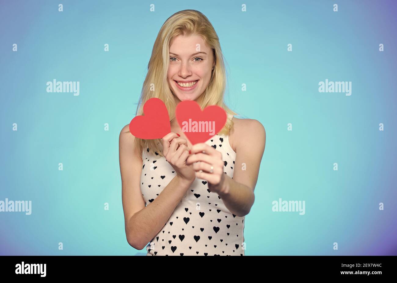Woman cheerful girl hold heart valentines decoration. Happy valentines ...