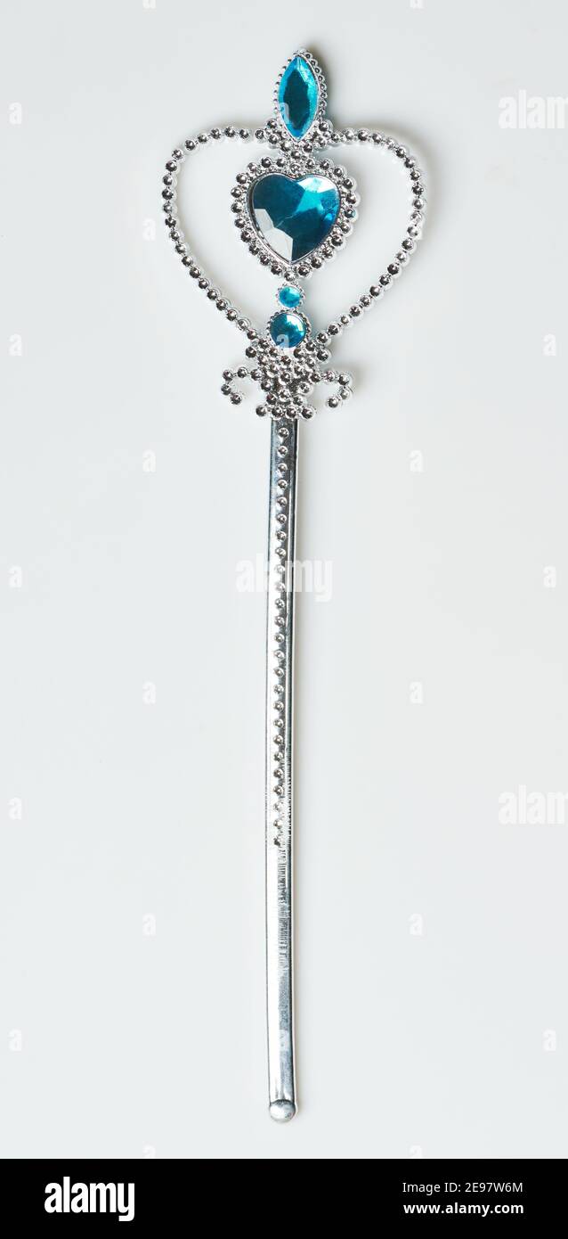 Silver magic stick with blue stone isolated on white studio background ...