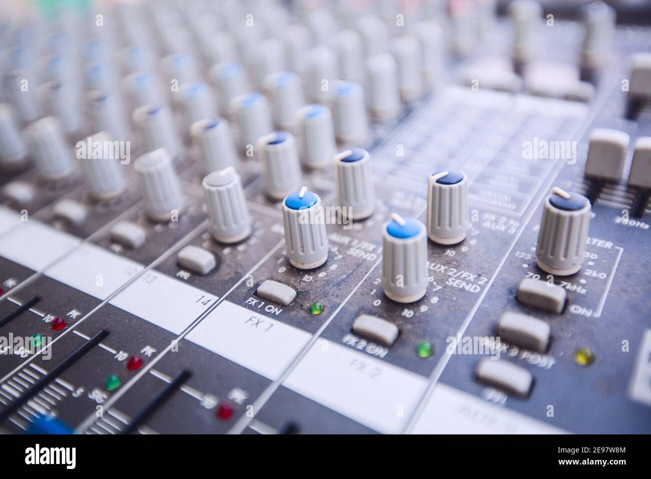 Sound mixer console, equipment for audio control, adjusting knobs ...