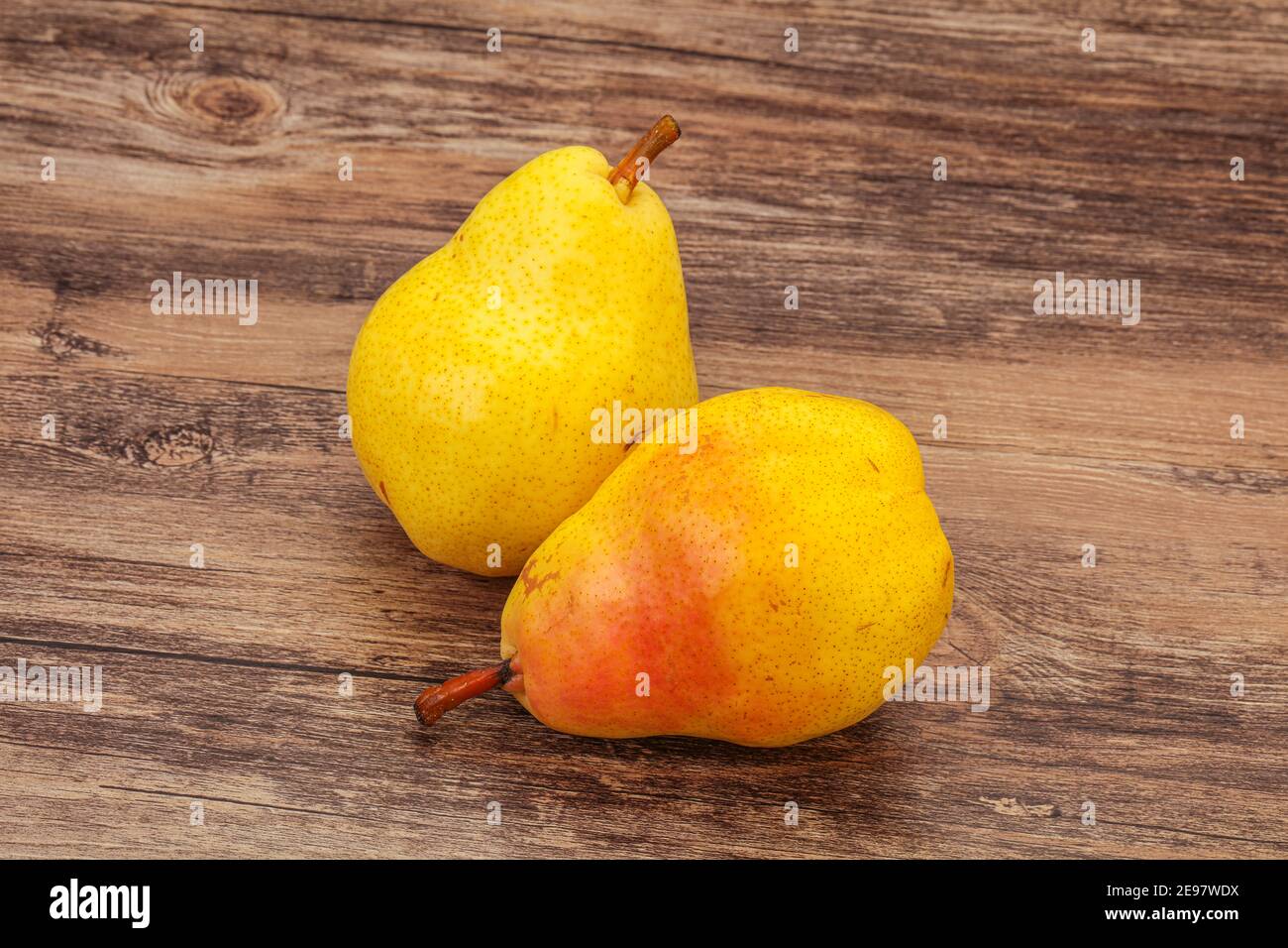 Fresh sweet yellow pear over background Stock Photo - Alamy