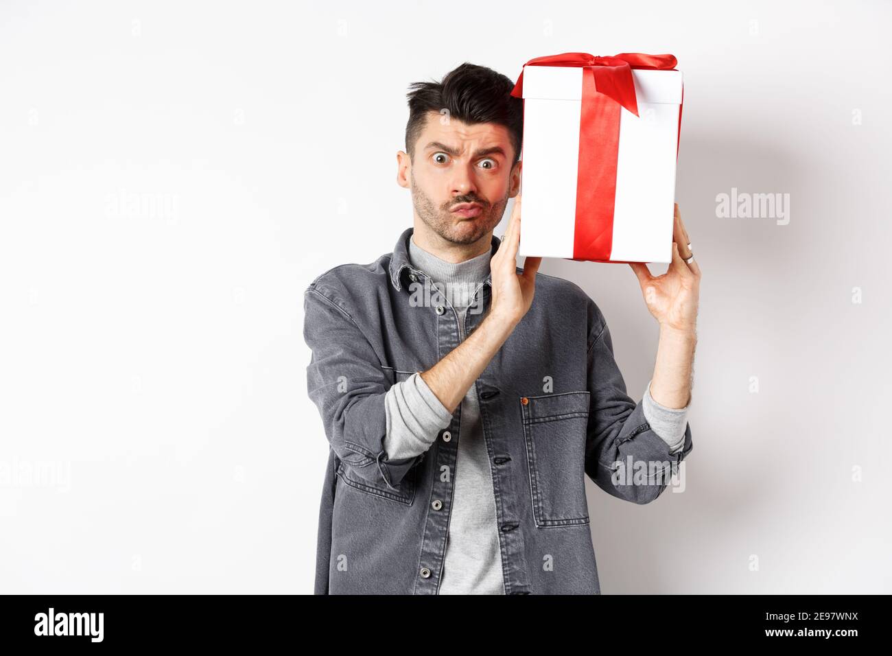 Looking confused at partner hi-res stock photography and images - Alamy