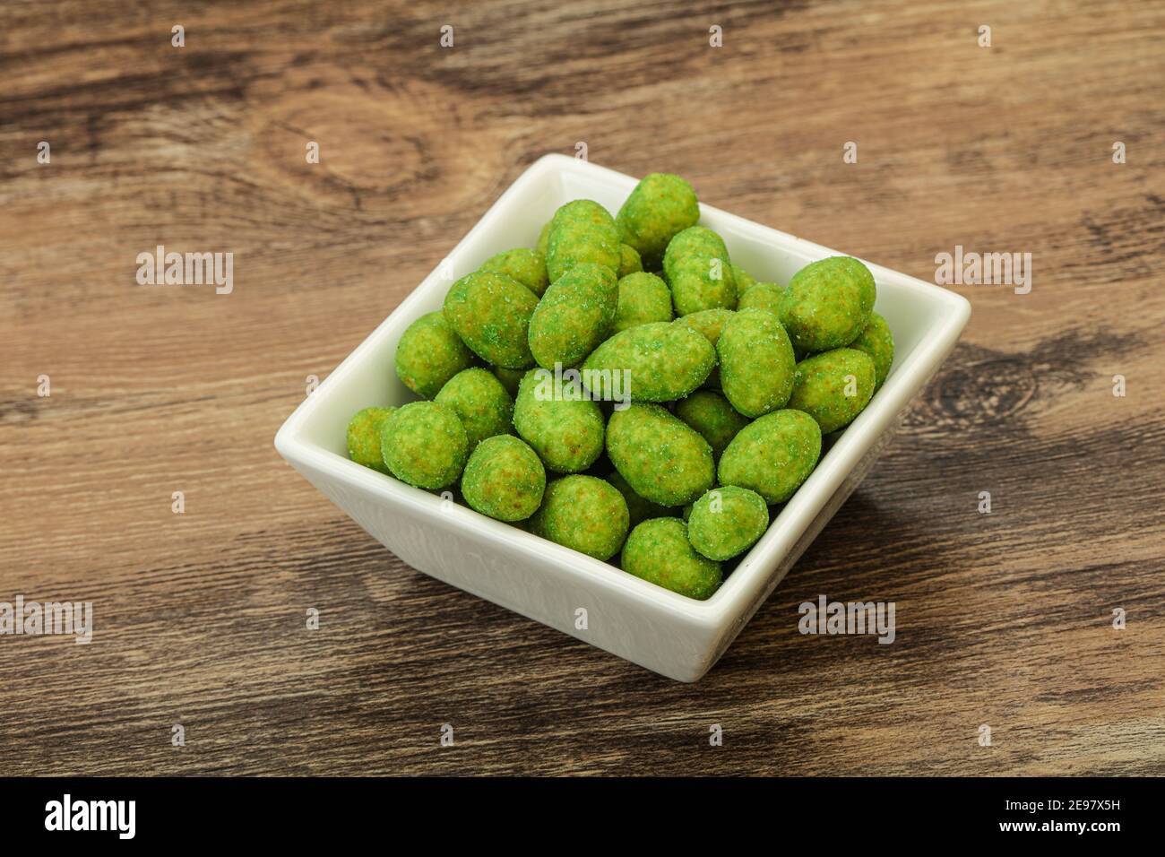 Spicy wasabi peanuts snack in the bowl Stock Photo - Alamy