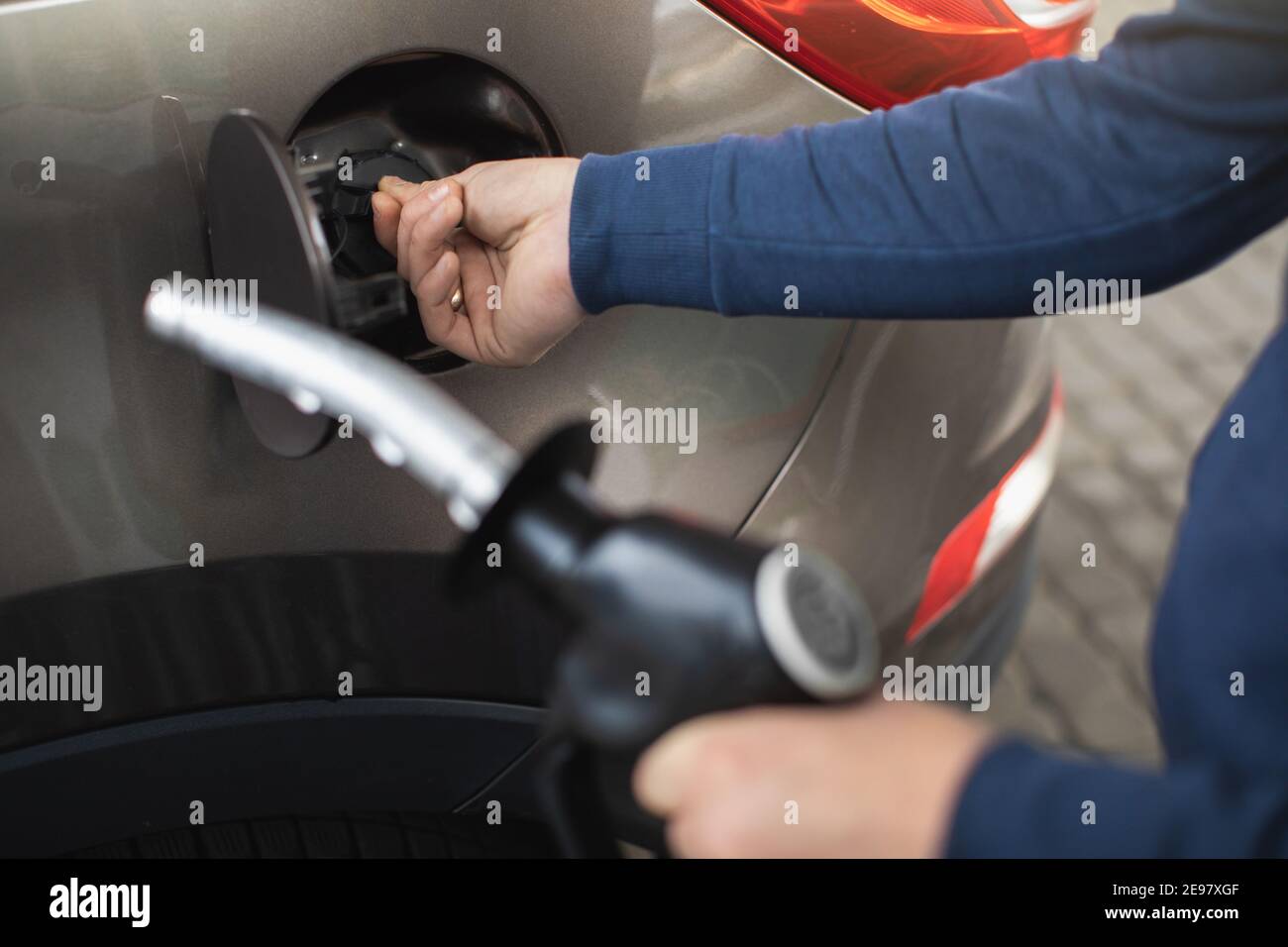 Man opening car fuel tank hi-res stock photography and images - Alamy