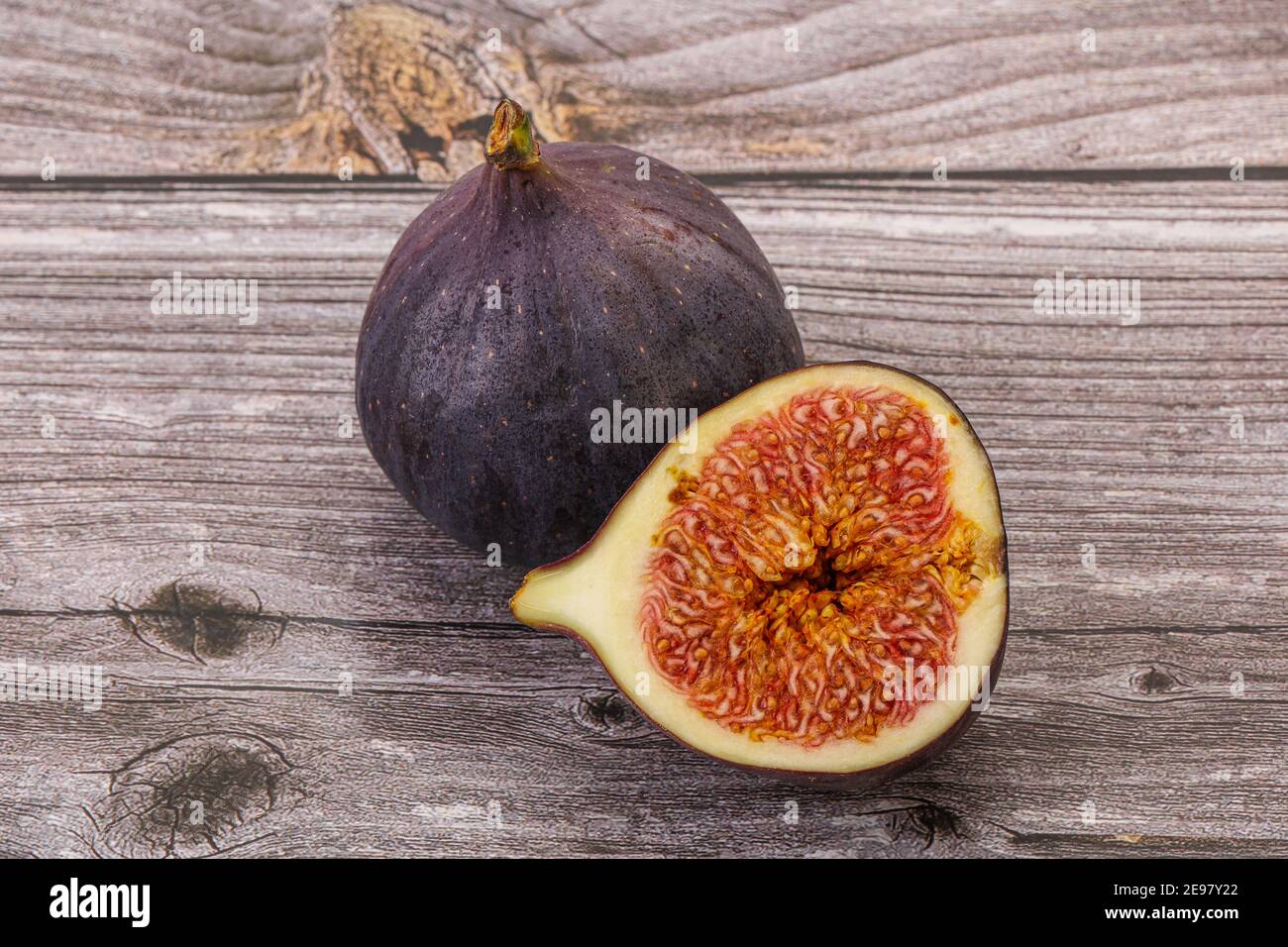 Sweet purple slice of fig fruit Stock Photo - Alamy