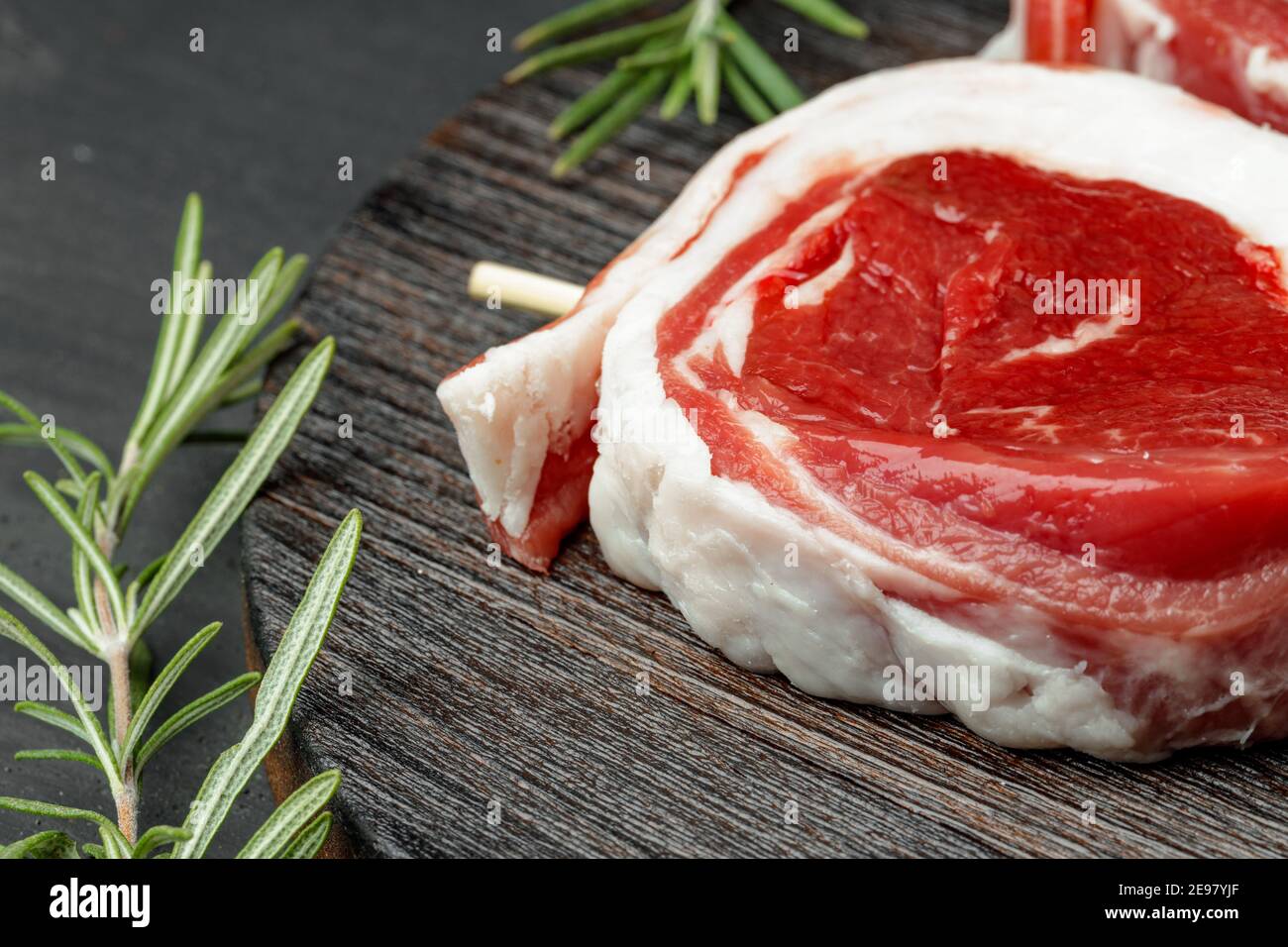fresh meat with ingredients for cooking on dark background Stock Photo ...
