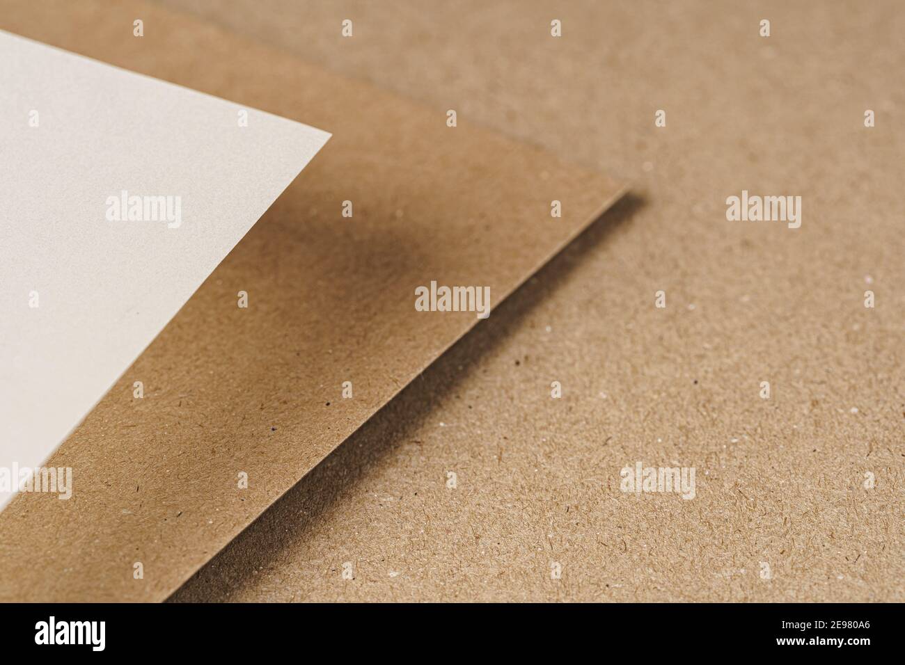 Brown recycled carton paper sheets close up Stock Photo - Alamy