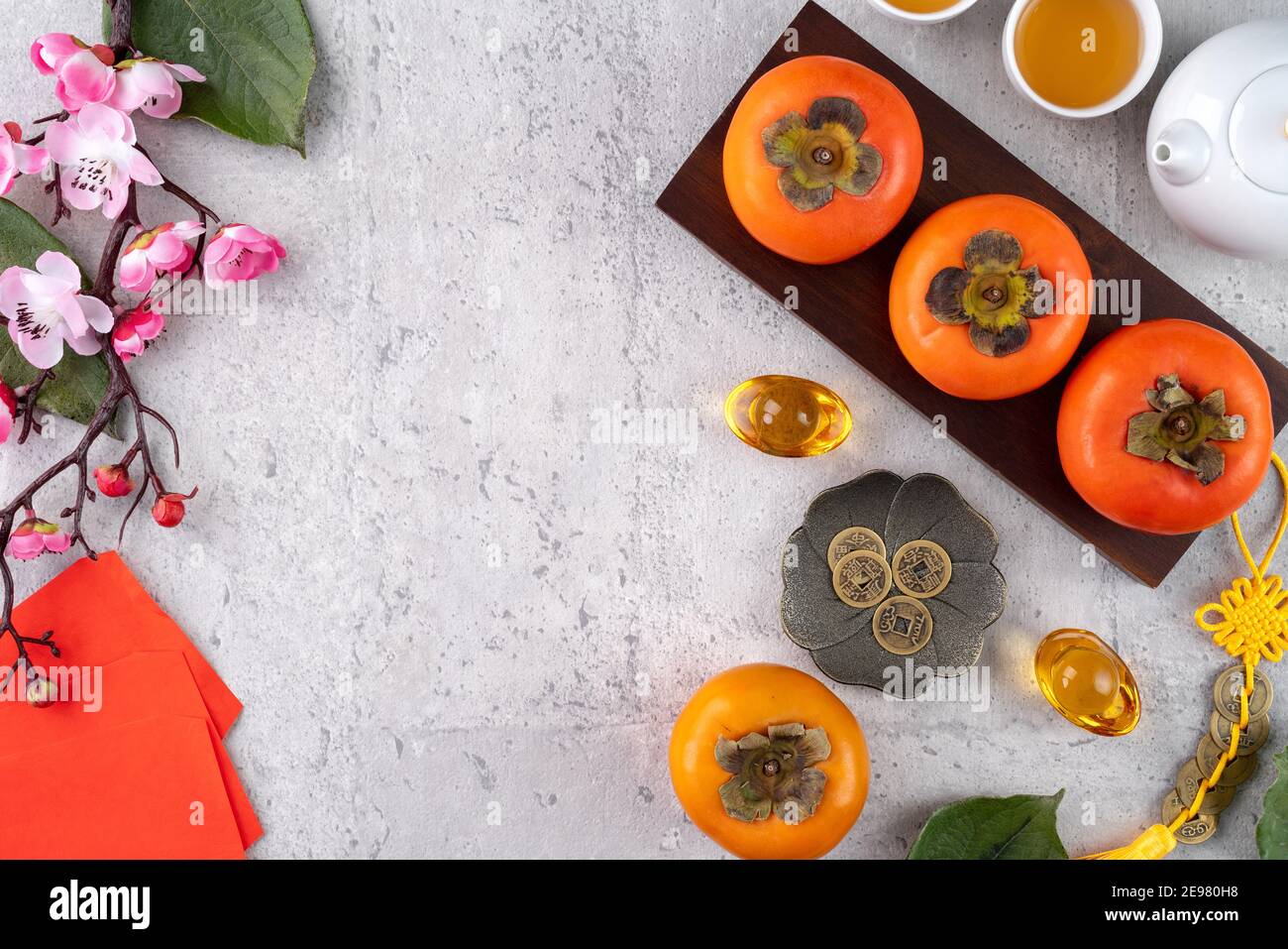 Fresh persimmons on gray table background for Chinese new year fruit ...