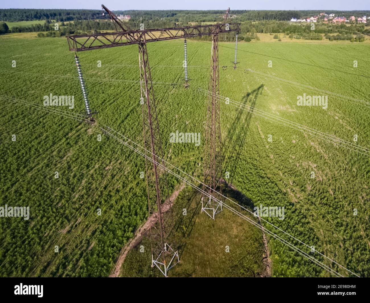 Power line supports. Electricity transmission and posts Stock Photo - Alamy