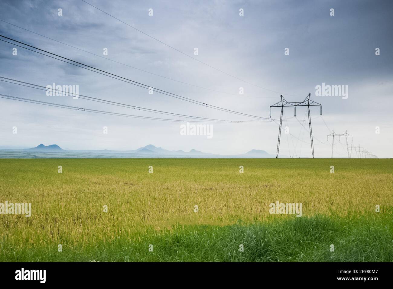 Power line supports. Electricity transmission and posts Stock Photo - Alamy