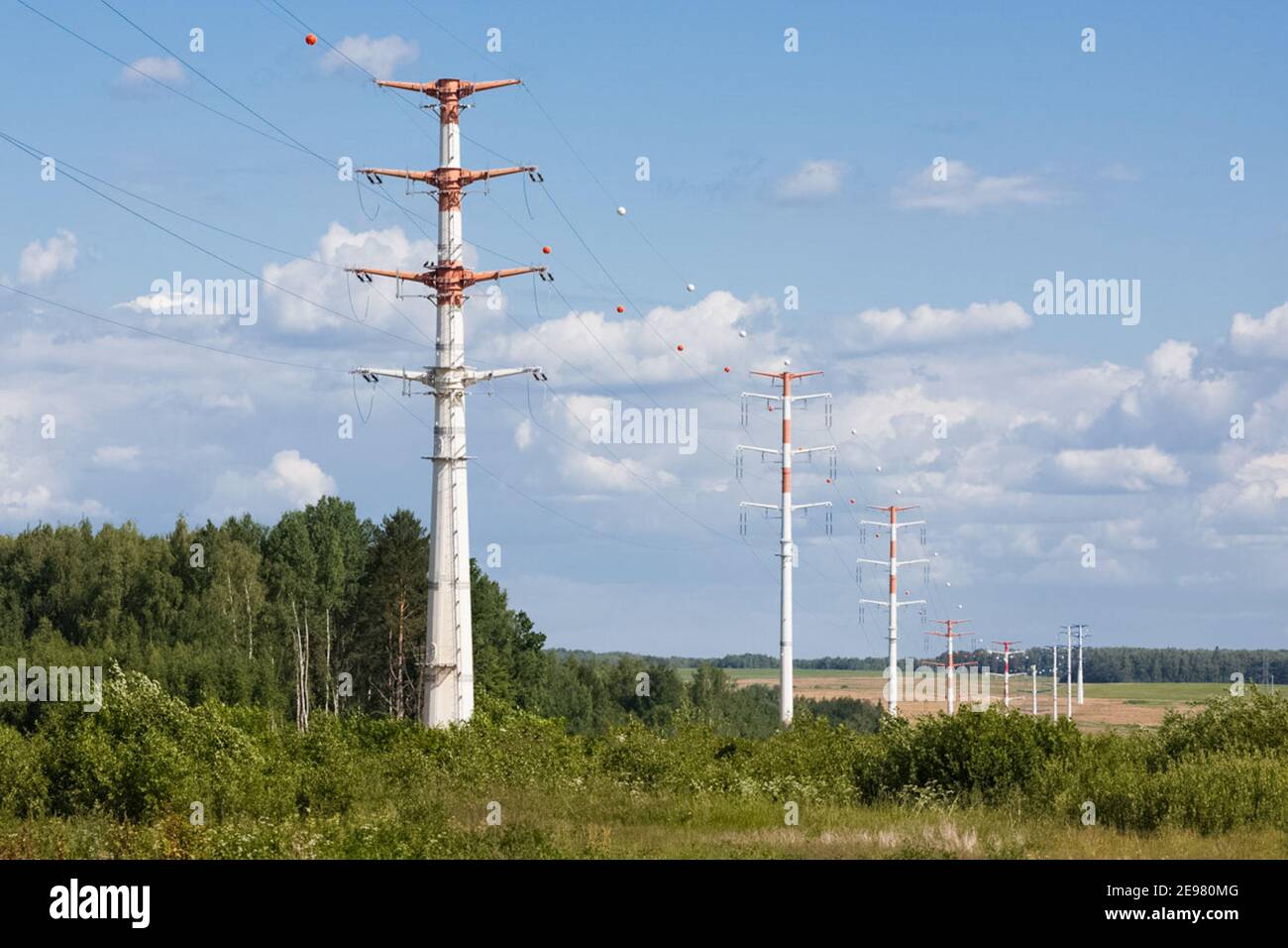 Power line supports. Electricity transmission and posts Stock Photo - Alamy
