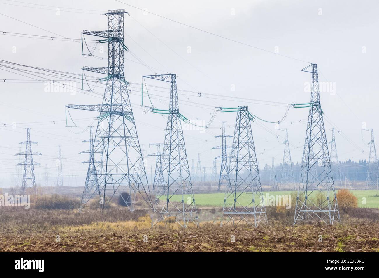 Power line supports. Electricity transmission and posts Stock Photo - Alamy
