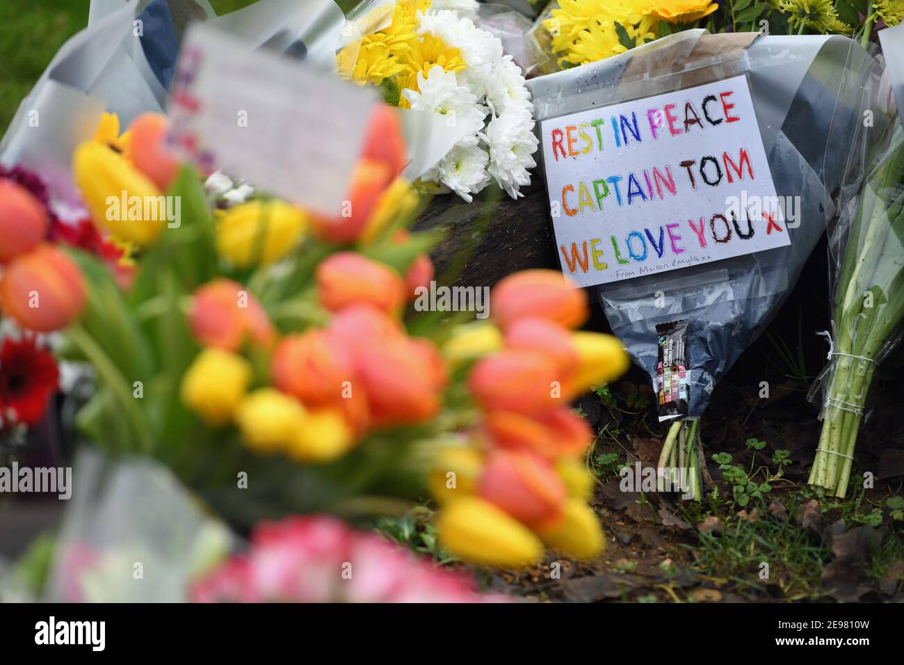Floral tributes outside the home of Captain Sir Tom Moore in Marston ...