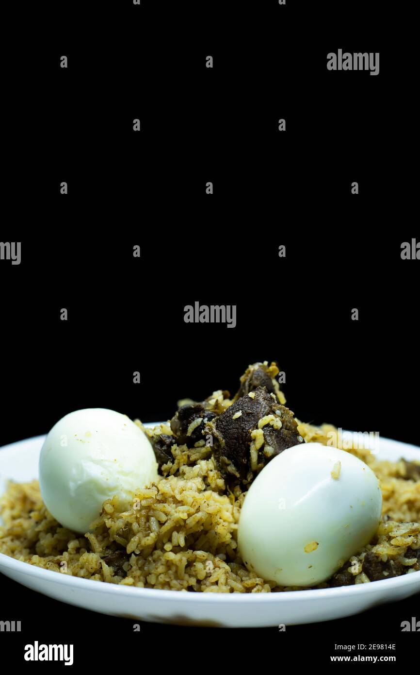 South Indian Mutton Biryani food on black background Stock Photo - Alamy