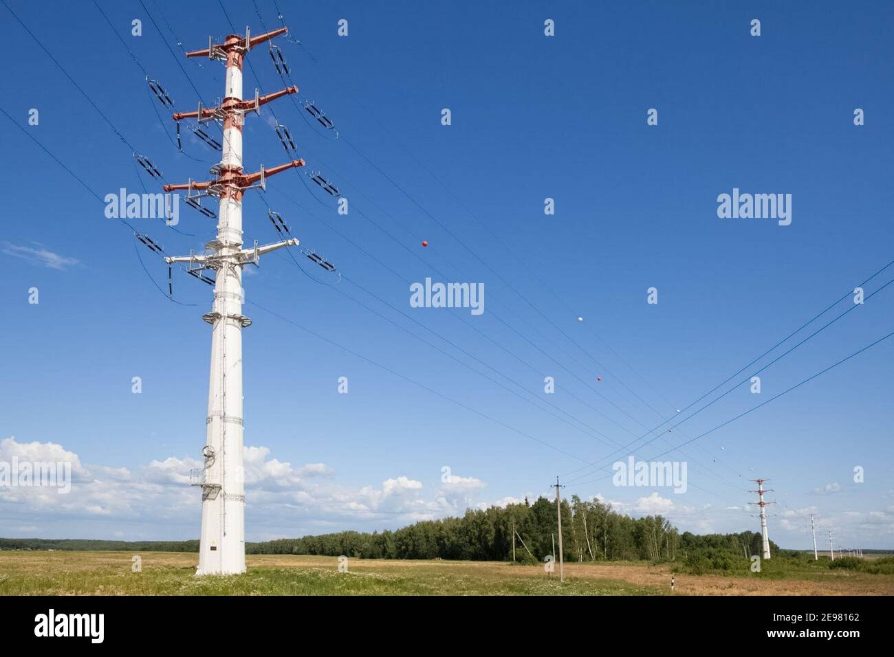 Power line supports. Electricity transmission and posts Stock Photo - Alamy