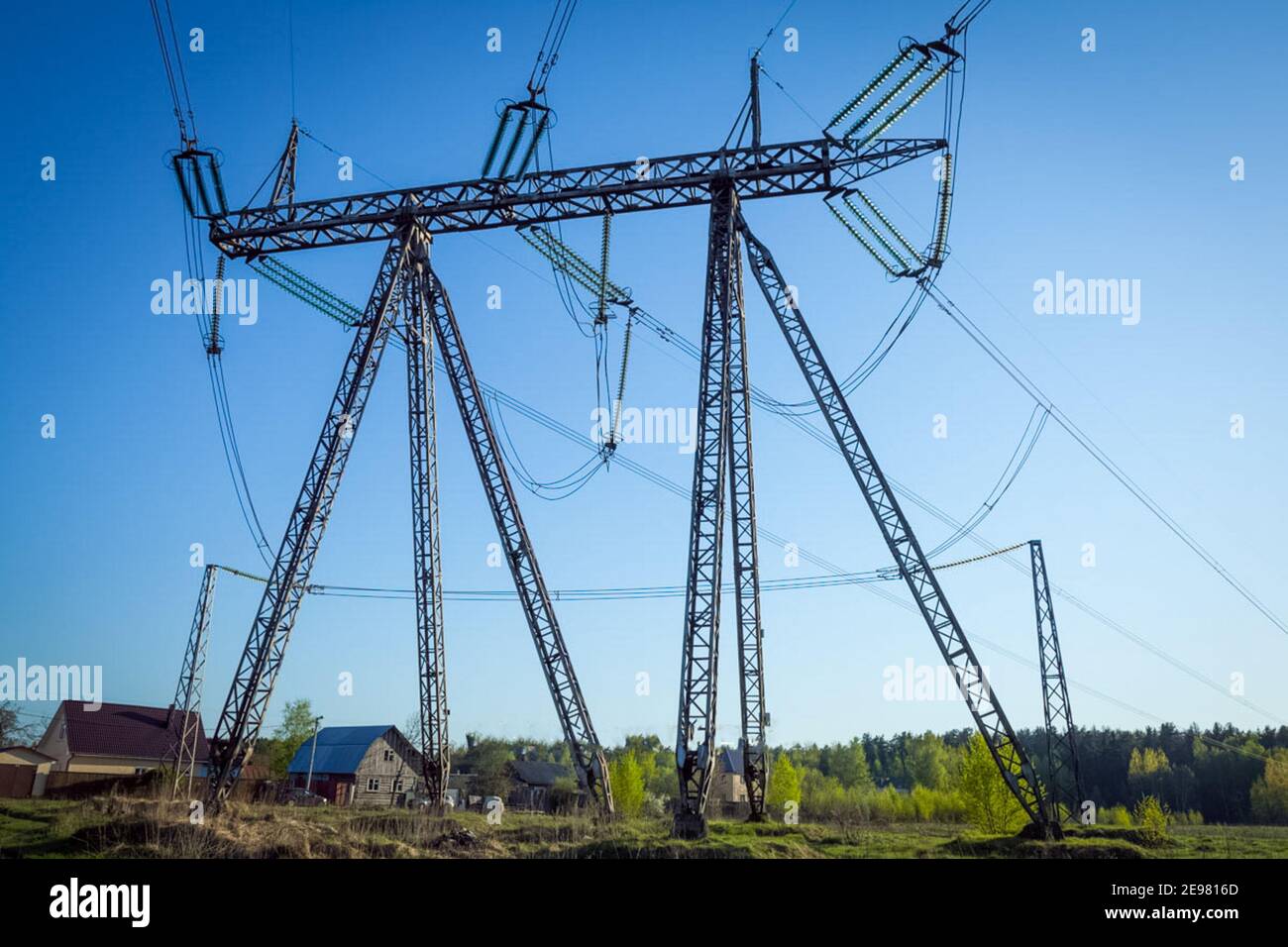 Power line supports. Electricity transmission and posts Stock Photo - Alamy