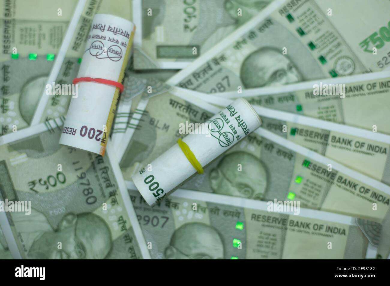 Rolls of 500 and 200 Indian rupee money banknote, Indian Currency ...