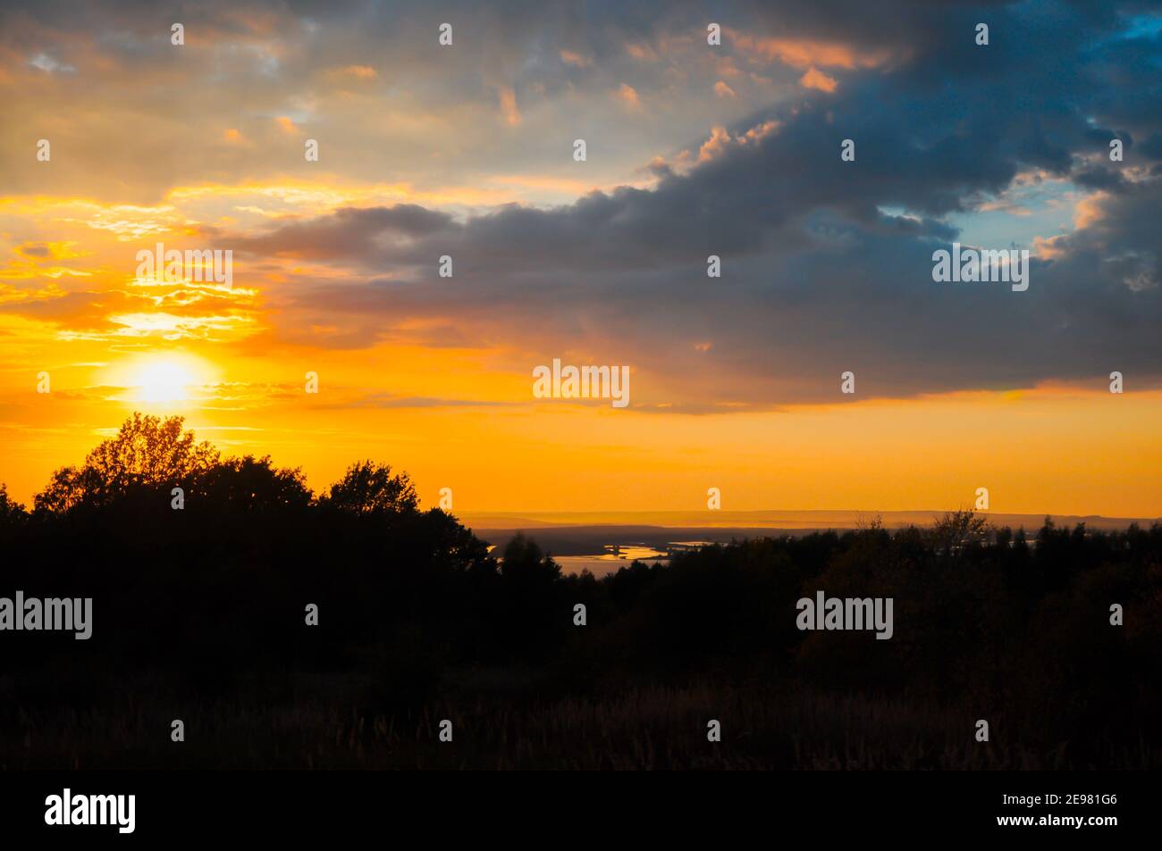 Colorful autumn landscape at sunset, view of the sunlit hills, the ...