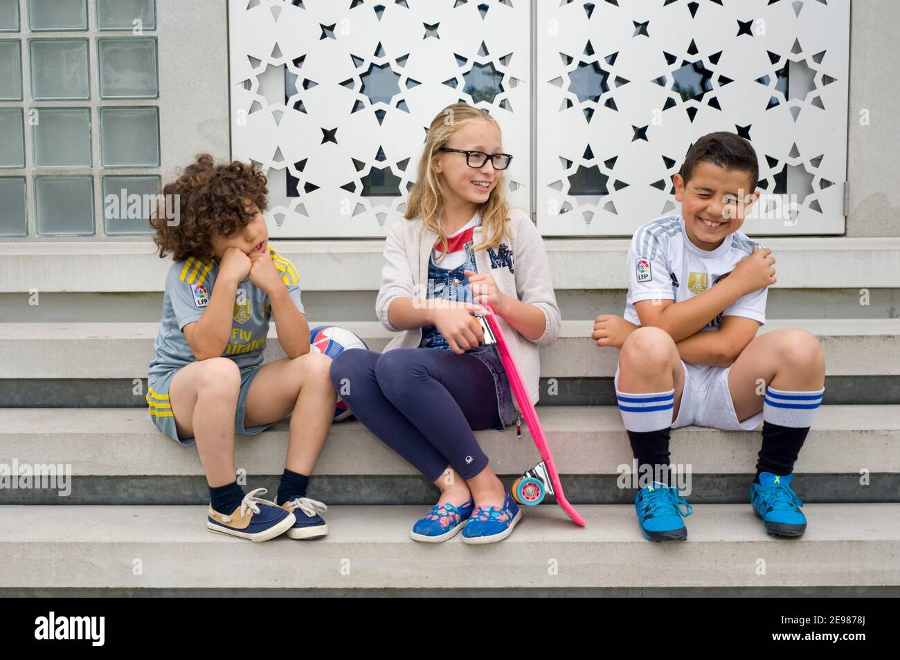 Mosque, children play, football, street photography Stock Photo - Alamy