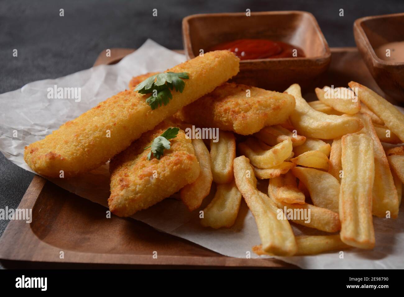 Traditional English Food - Fish and Chips. Fried fish filets and crispy ...