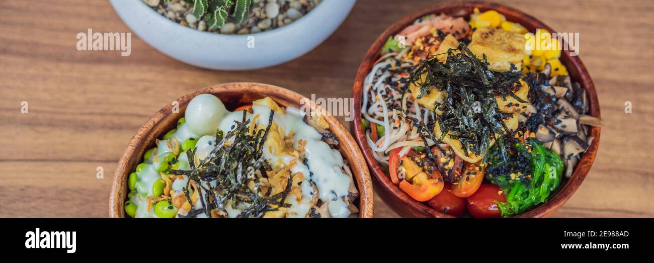 Raw Organic Poke Bowl with Rice and Veggies close-up on the table. Top ...
