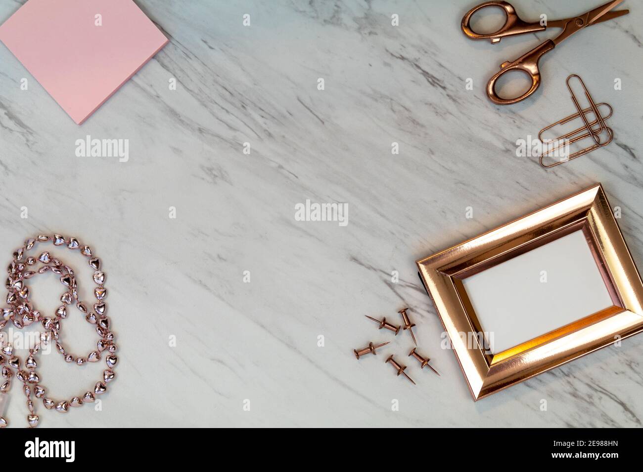 Rose Gold frame mockup and Pink on Marble flat lay Stock Photo - Alamy