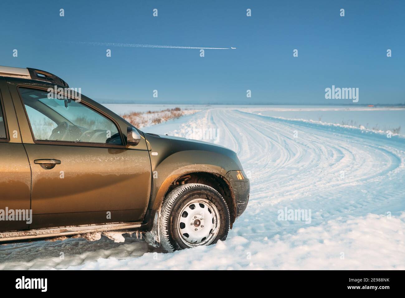 Car Renault Duster Or Dacia Duster Suv Parked On Winter Snowy Field ...
