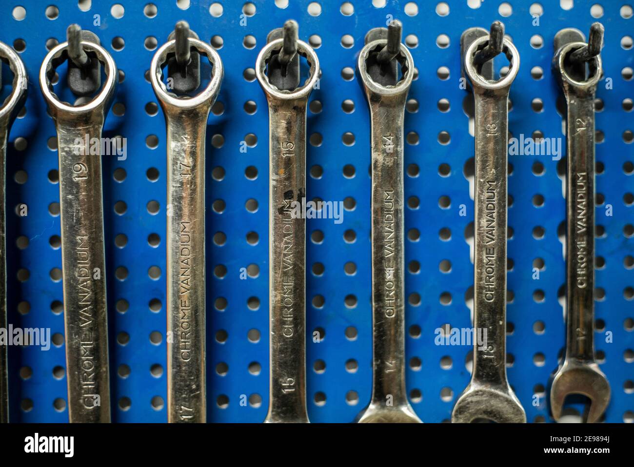 Wrenches hanging on the shelf in the mechanical workshop Stock Photo ...