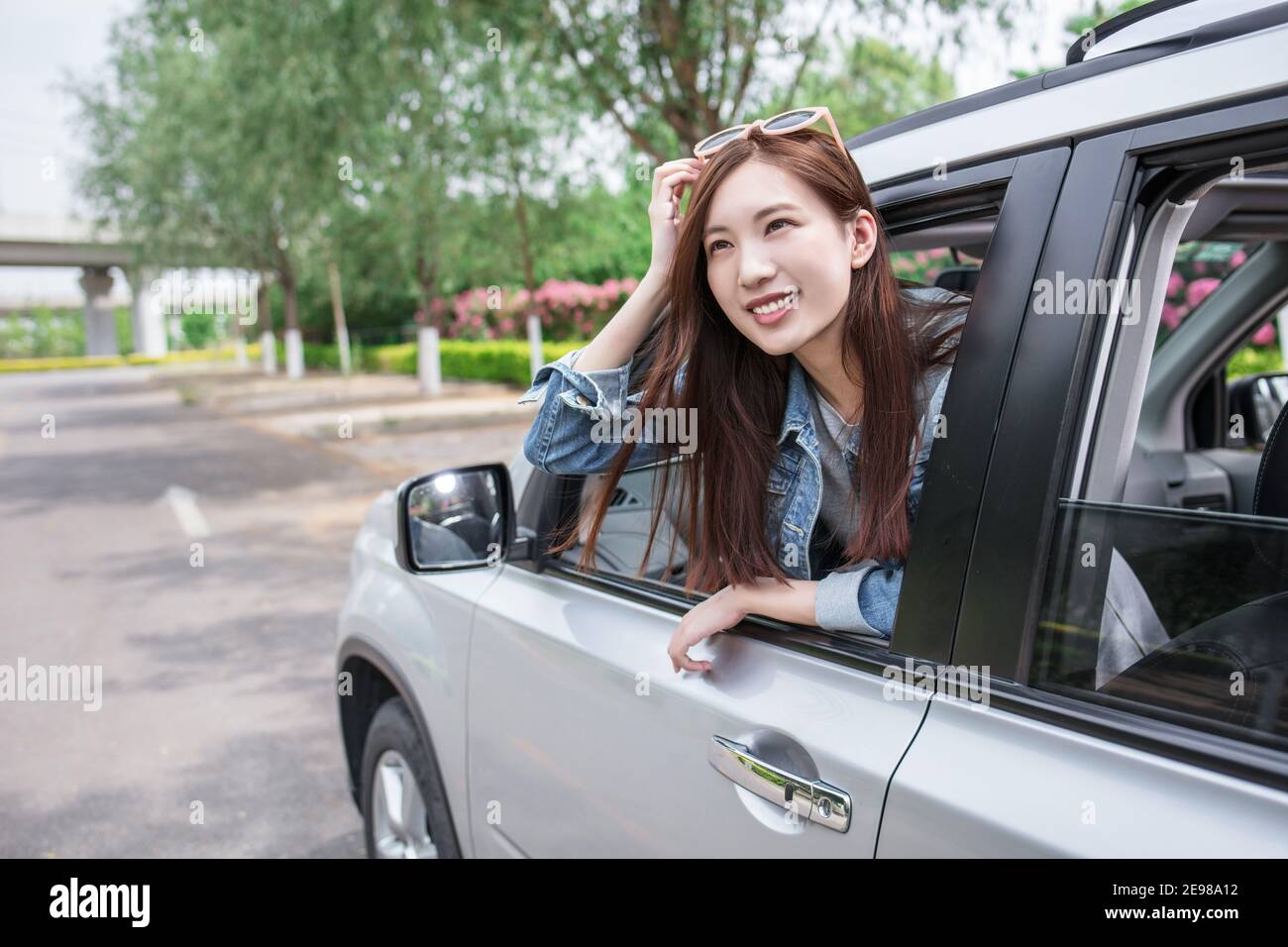 Young Happy Smiling Woman driving Car Stock Photo - Alamy