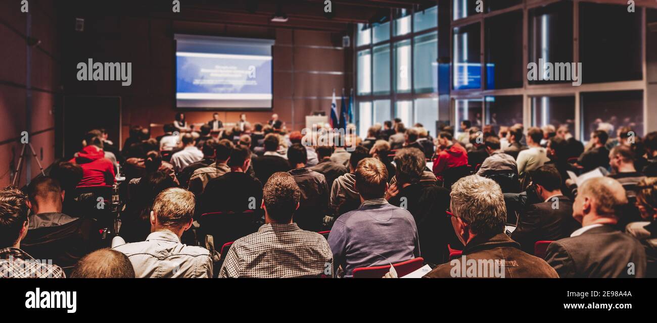 Speaker giving presentation on business conference meeting Stock Photo ...