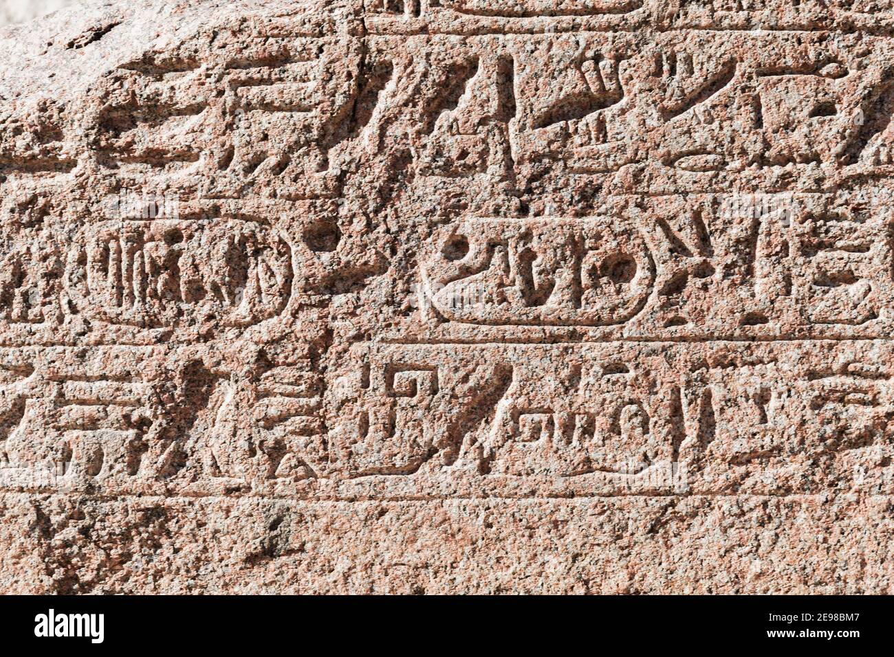 Alexandria, Egypt. Stone wall with carved Egyptian hieroglyphs. Pompeys ...
