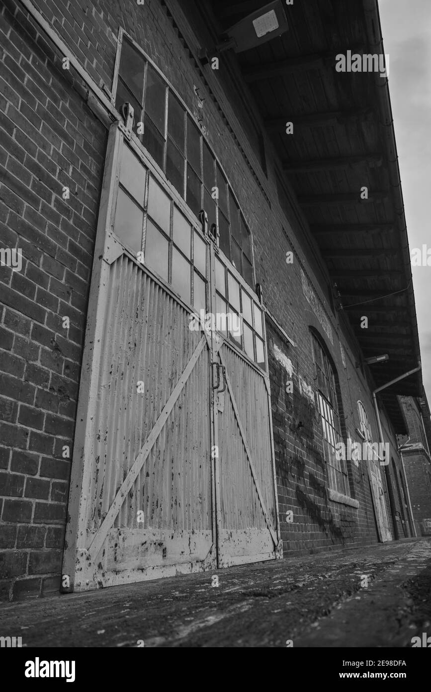 The loading ramp of an old warehouse, loading ramp and a sliding gate ...