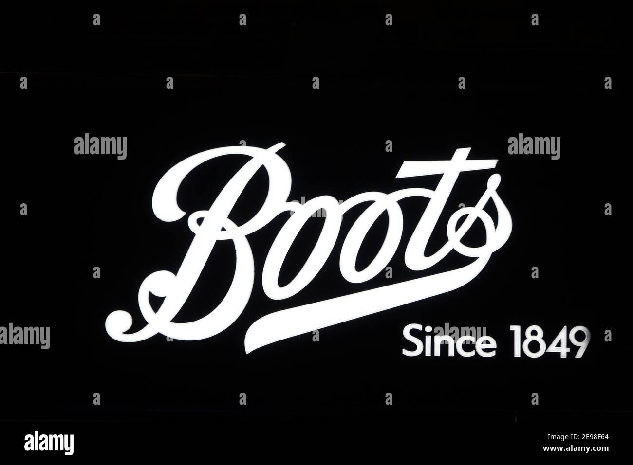 Boots pharmacy, health and beauty retailer shop logo. White text on a ...