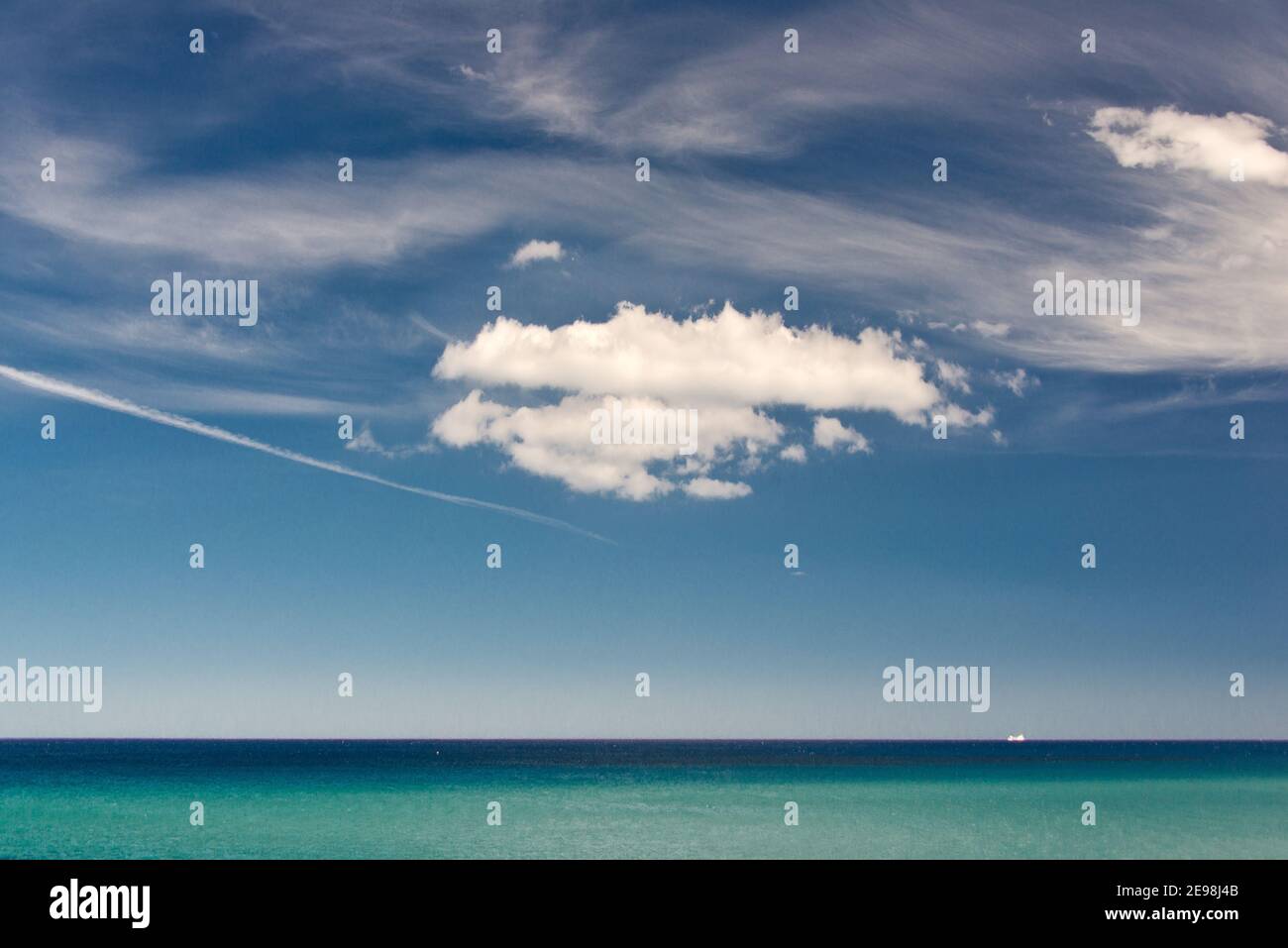 crystal clear water, blue sea and blue sky for background Stock Photo ...