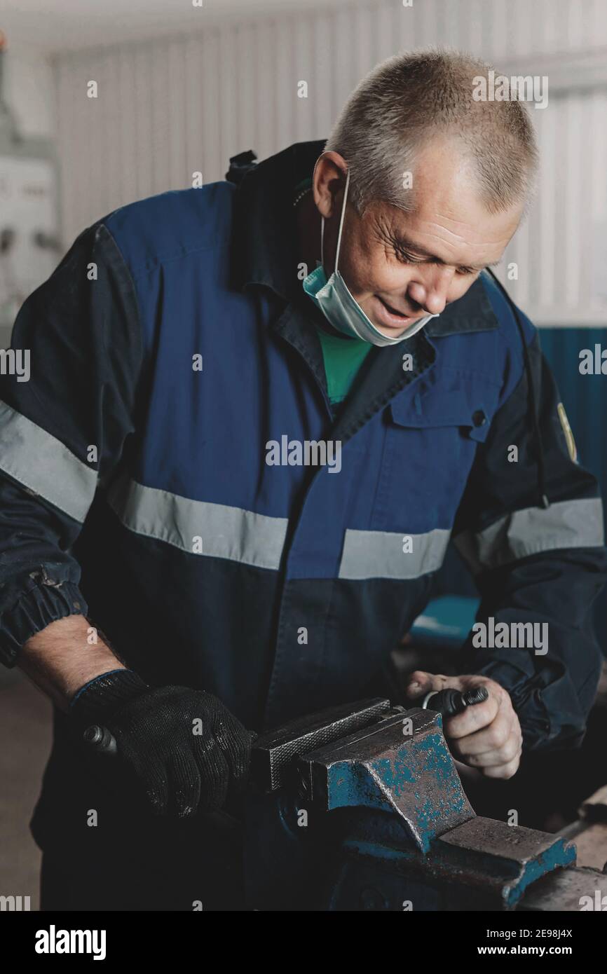 Mechanic working work bench hi-res stock photography and images - Alamy