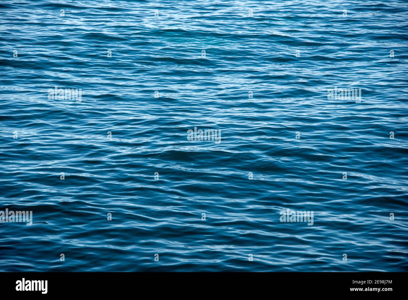 crystal clear water, blue sea and blue sky for background Stock Photo ...