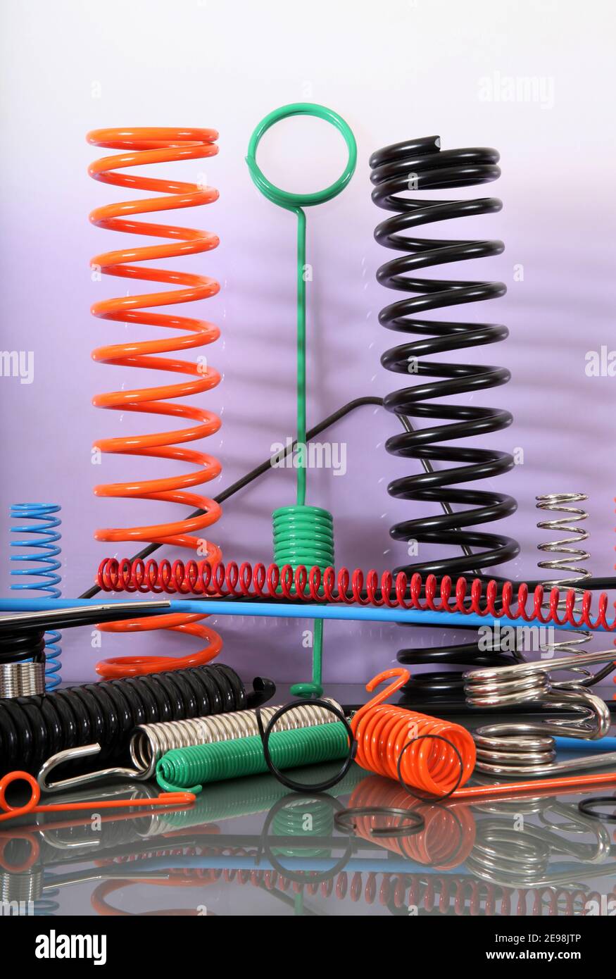 Metal springs in different sizes Stock Photo - Alamy
