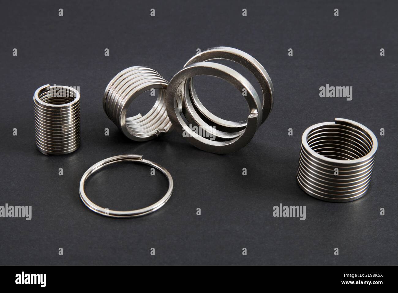 Metal springs in different sizes Stock Photo - Alamy