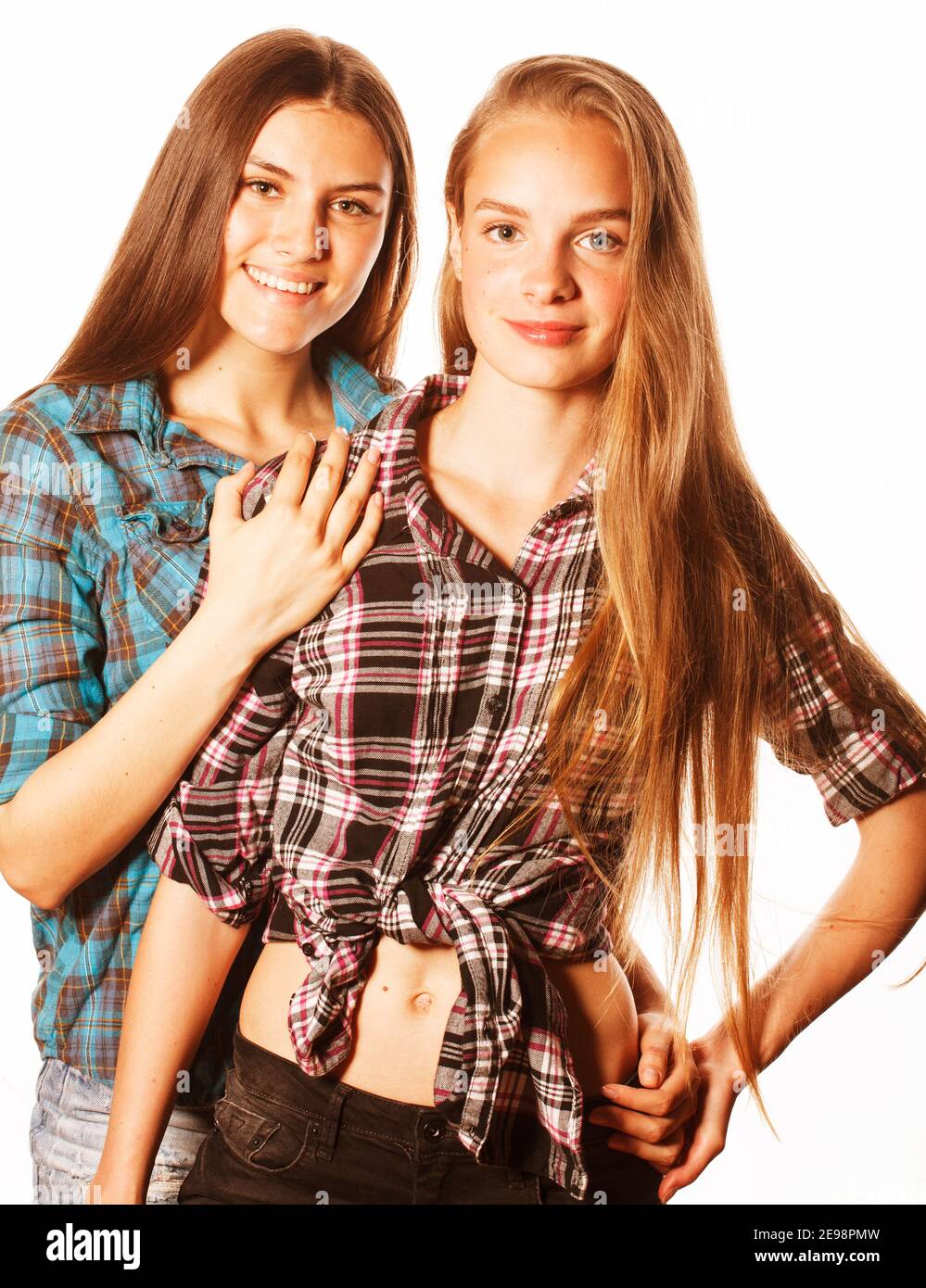 two cute teenagers having fun together isolated on white Stock Photo ...