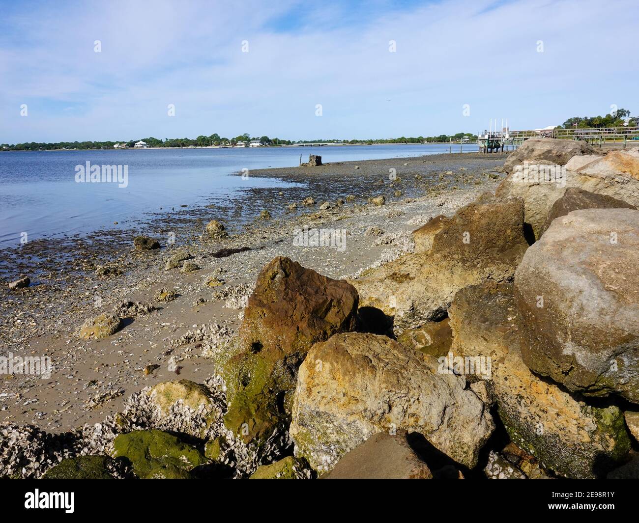 Shore line at low tide with calm water, Cedar Key, Florida, USA Stock ...