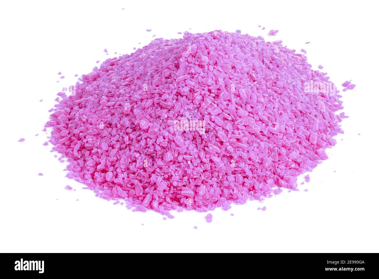 Pile of dry pink chemical granules - close-up isolated on white ...