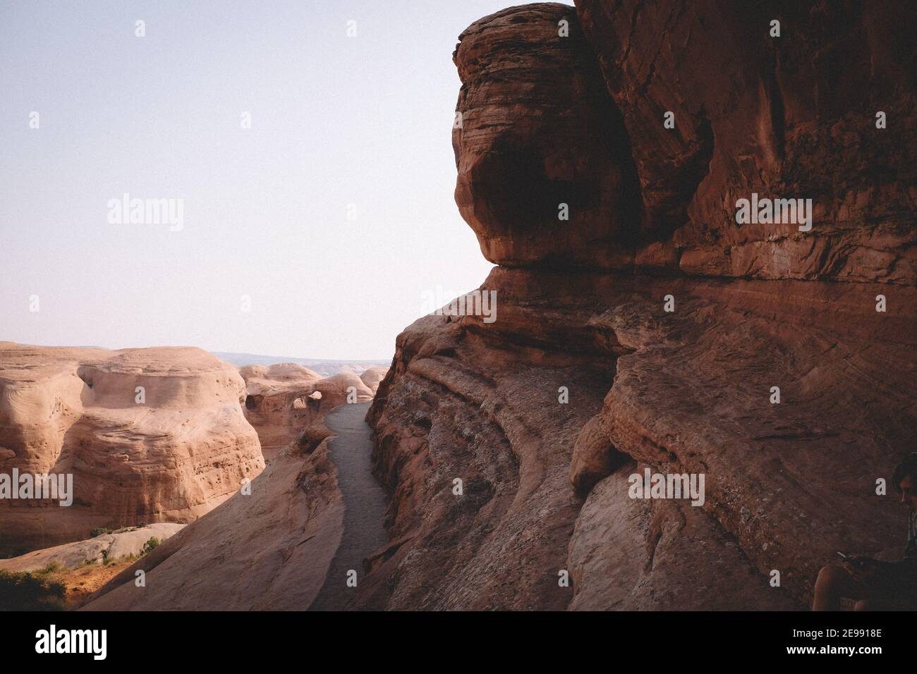 Stone Trail Curves Around Sandstone Cliffs Stock Photo - Alamy
