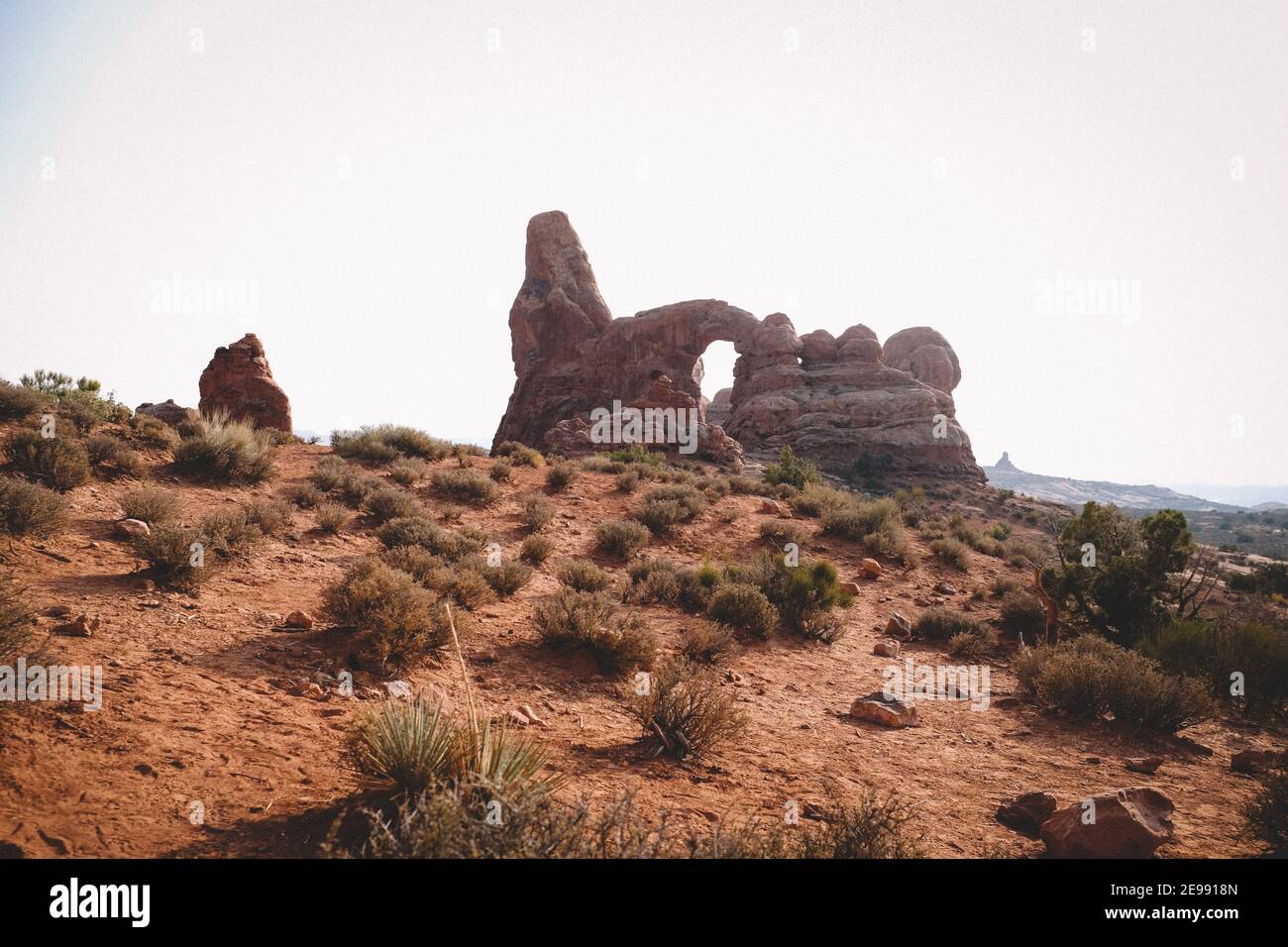 Turret Arch Rises from a Desert landscape in Utah Stock Photo - Alamy
