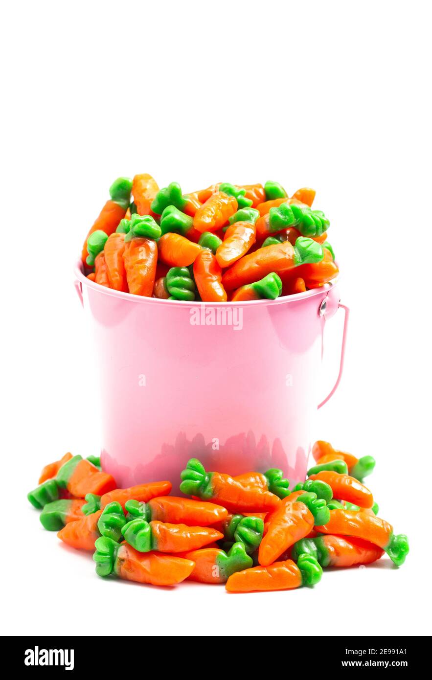Gummy Candy Carrots in a Pink Bucket Stock Photo - Alamy