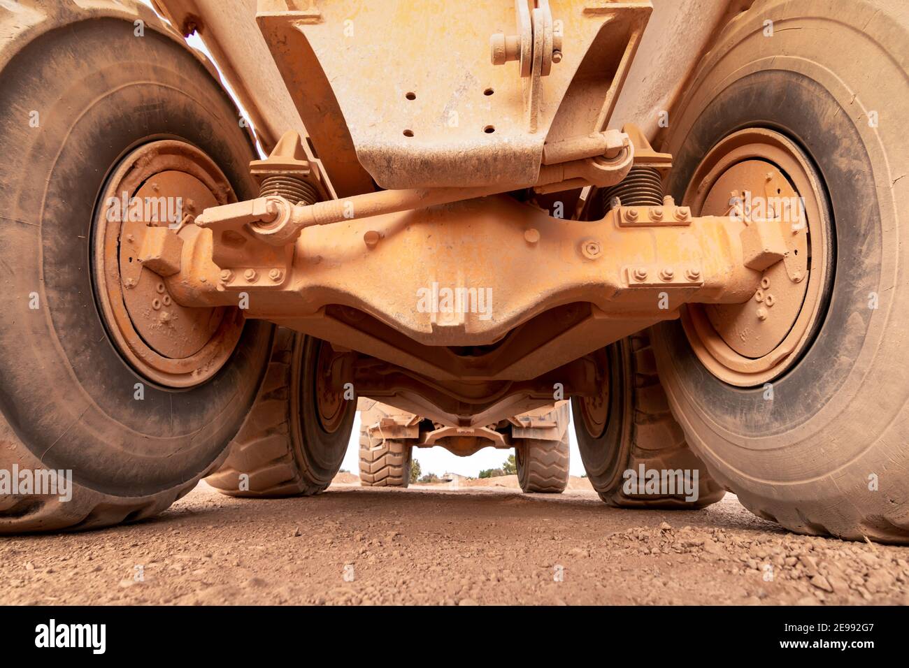 View of the underside of a large construction dump truck. Heavy ...