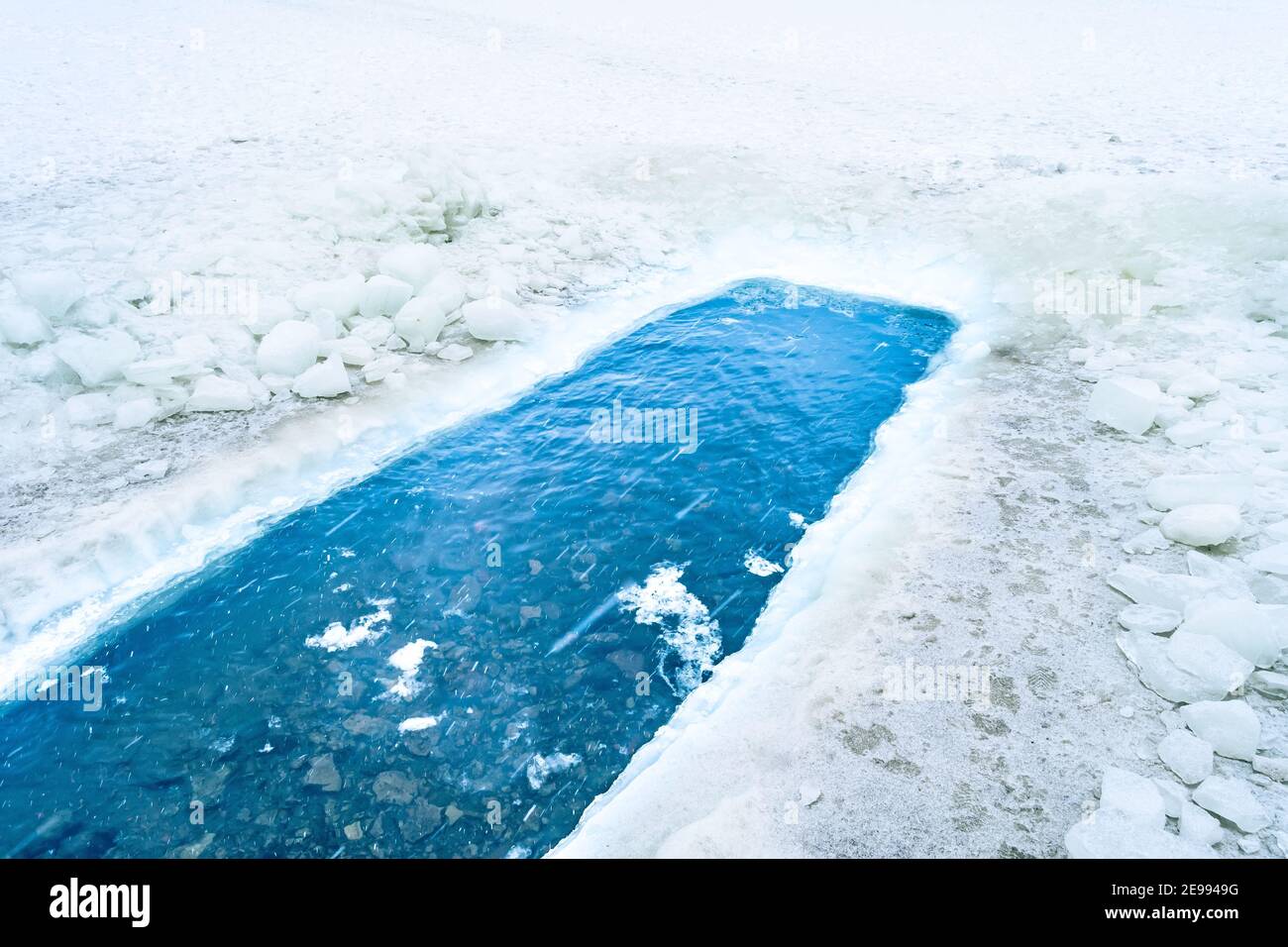 Hole in the ice carved out for swimming, hardening winter Stock Photo ...
