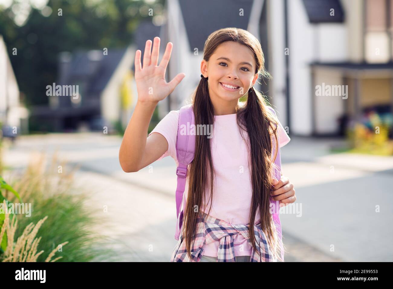 Little girl waving sign hi-res stock photography and images - Alamy