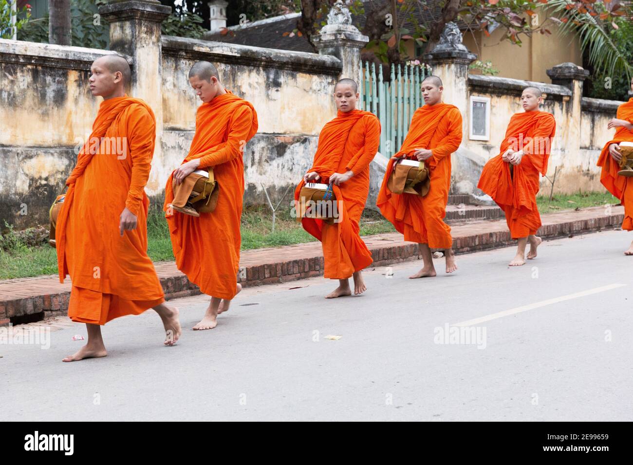 Luang Prabang, Laos Tak Bat or The monk's morning alms procession Stock ...