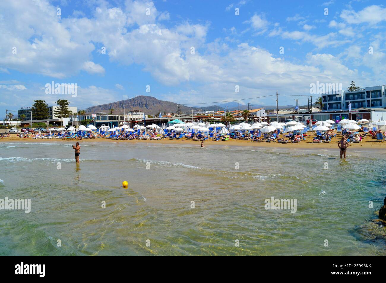 Tourists sunbathing on Gouves beach in Crete the largest and most ...
